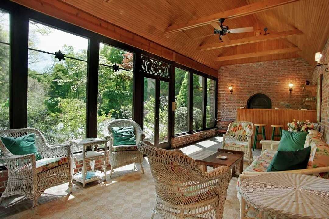 Midcountry home combines Dutch, British, French and Flemish styles