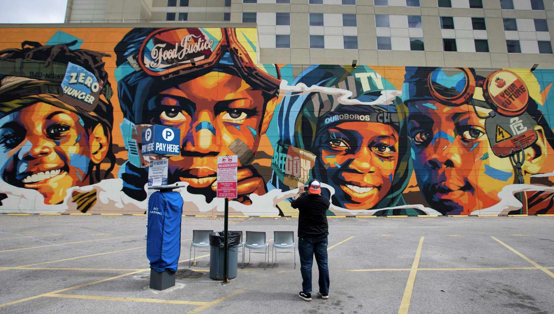 Massive Houston mural is done — and it has a message about hunger