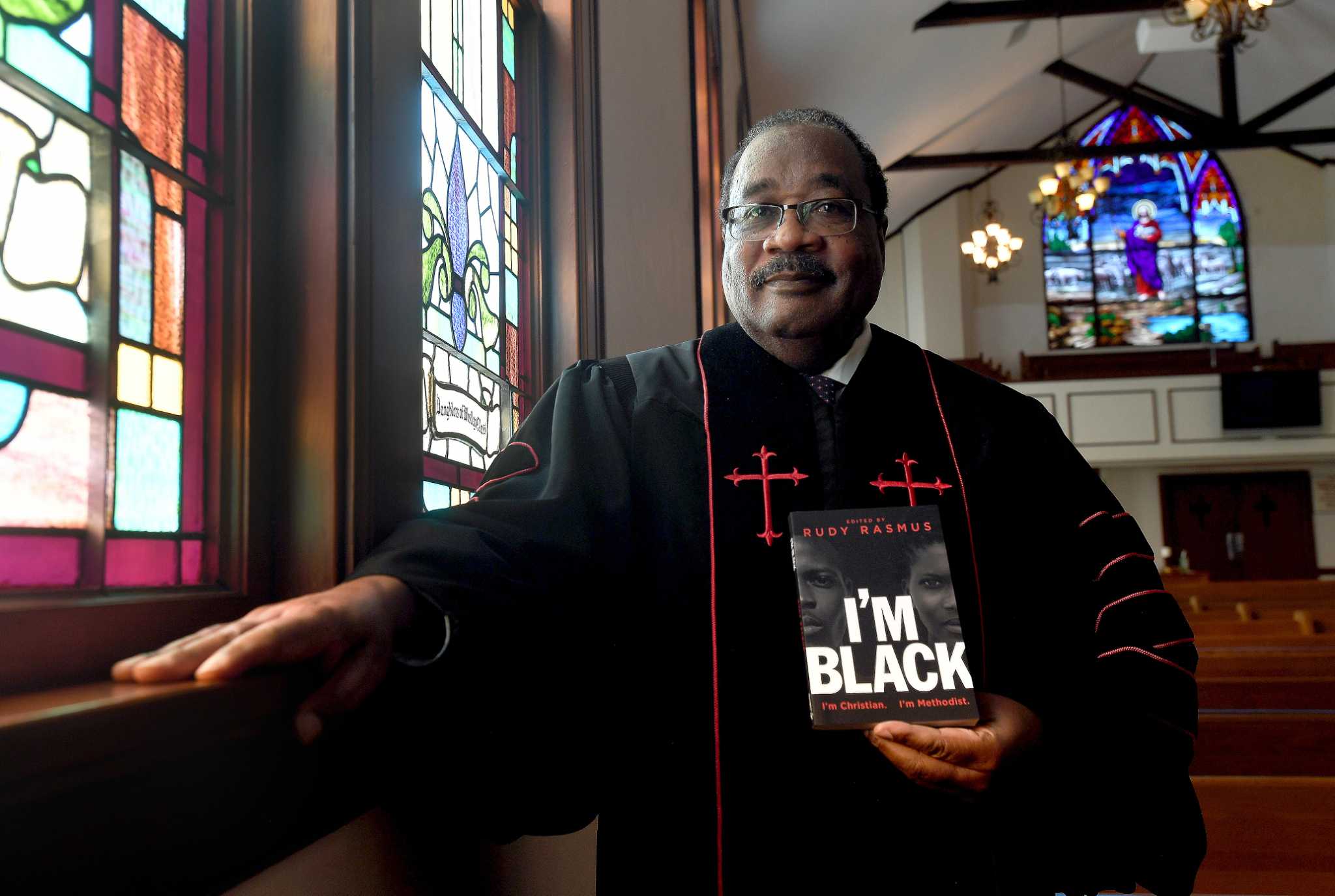 ‘Kneeling to stand,’ a Black pastor recounts journey of faith