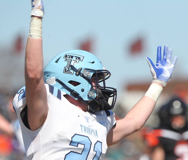 Triopia football team handles Beardstown in opener