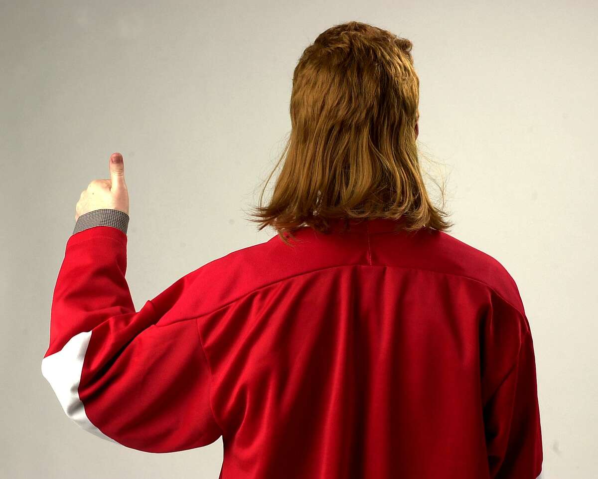 Yes, the COVID mullet is real. And it's spectacular.