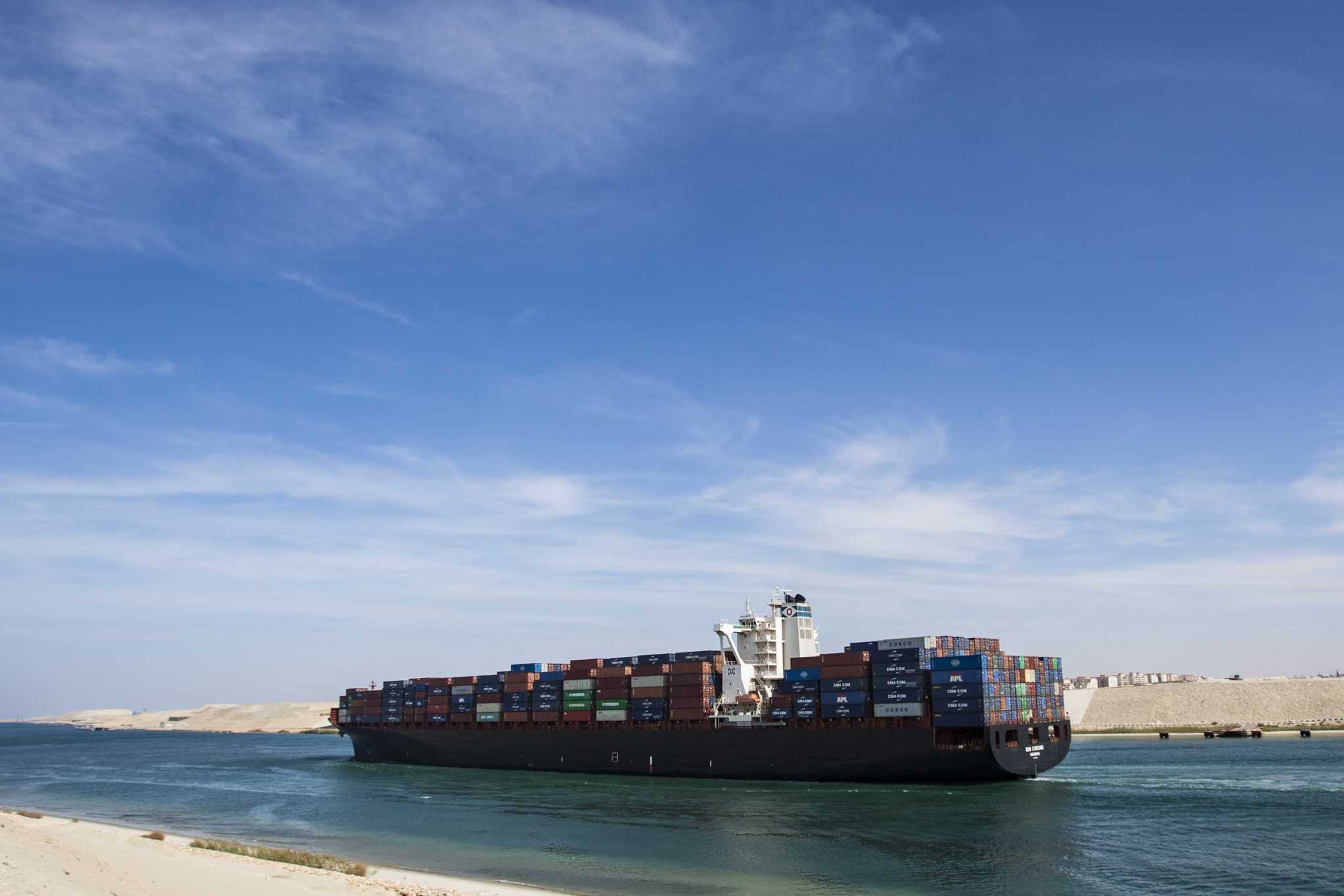 A colossal cargo ship turned sideways is blocking one of the most ...