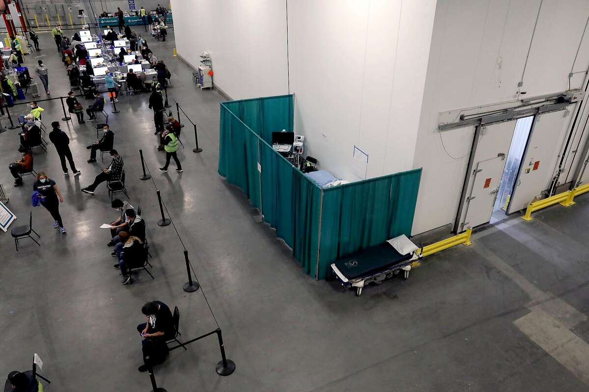 From empty shells to vaccination hubs: Why vast urban buildings can be ...