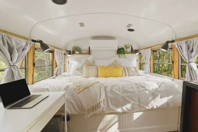 The Hill Country's coziest Airbnb is a converted school bus in the forest