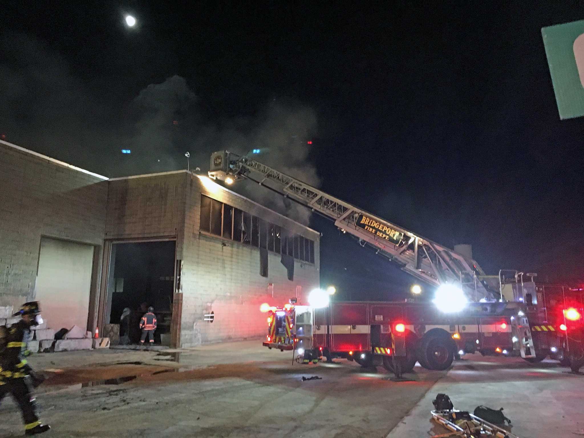 Fire official: Bulldozer bursts into flames in Bridgeport garage