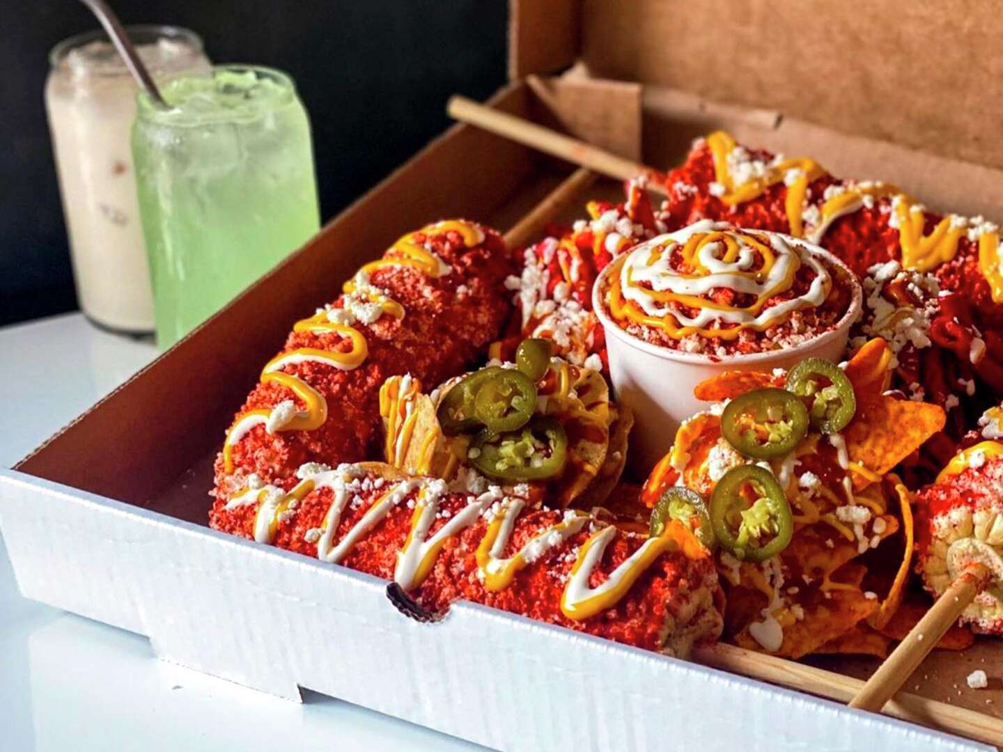 6 spots serving up elote en vaso that have the puro San Antonio stamp ...