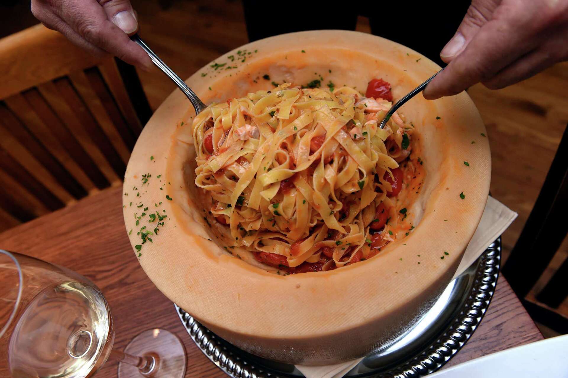 A made-to-order pasta dish inside a giant wheel of cheese? You can get ...