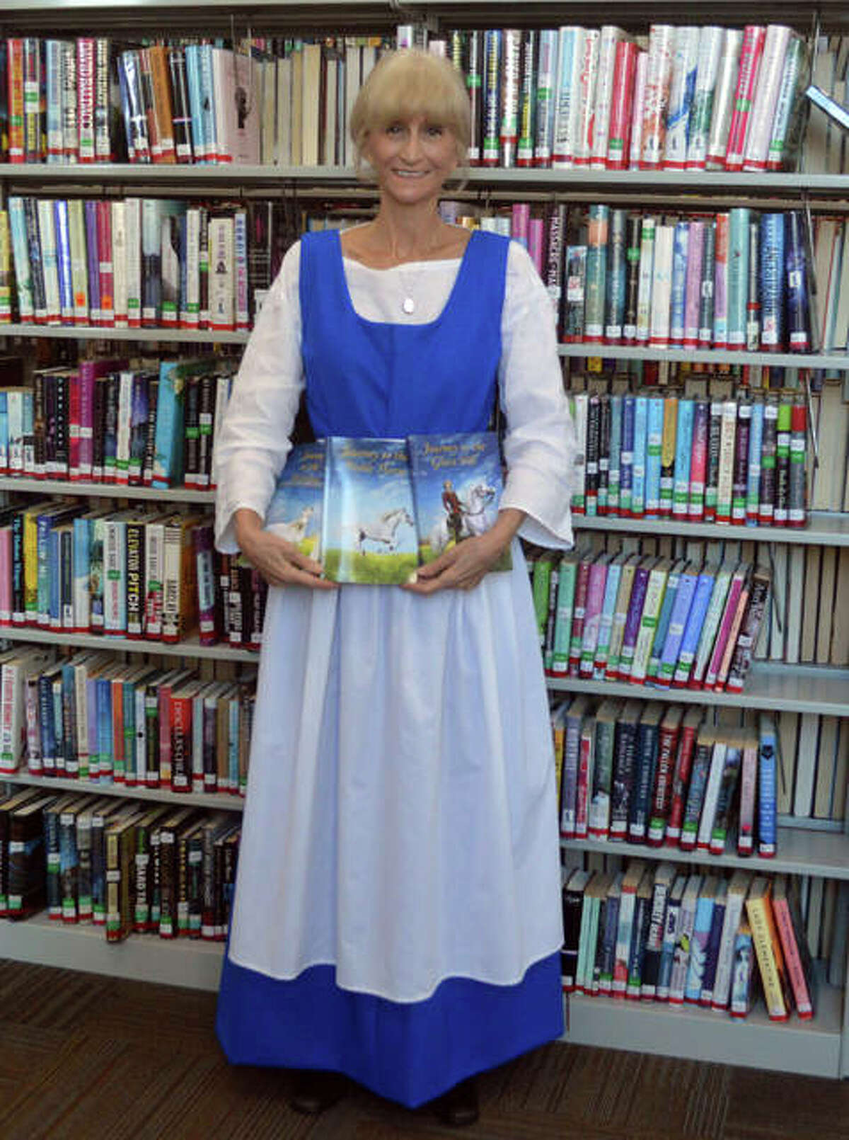 Retired Glen Carbon teacher pens fiction trilogy with real-life roots