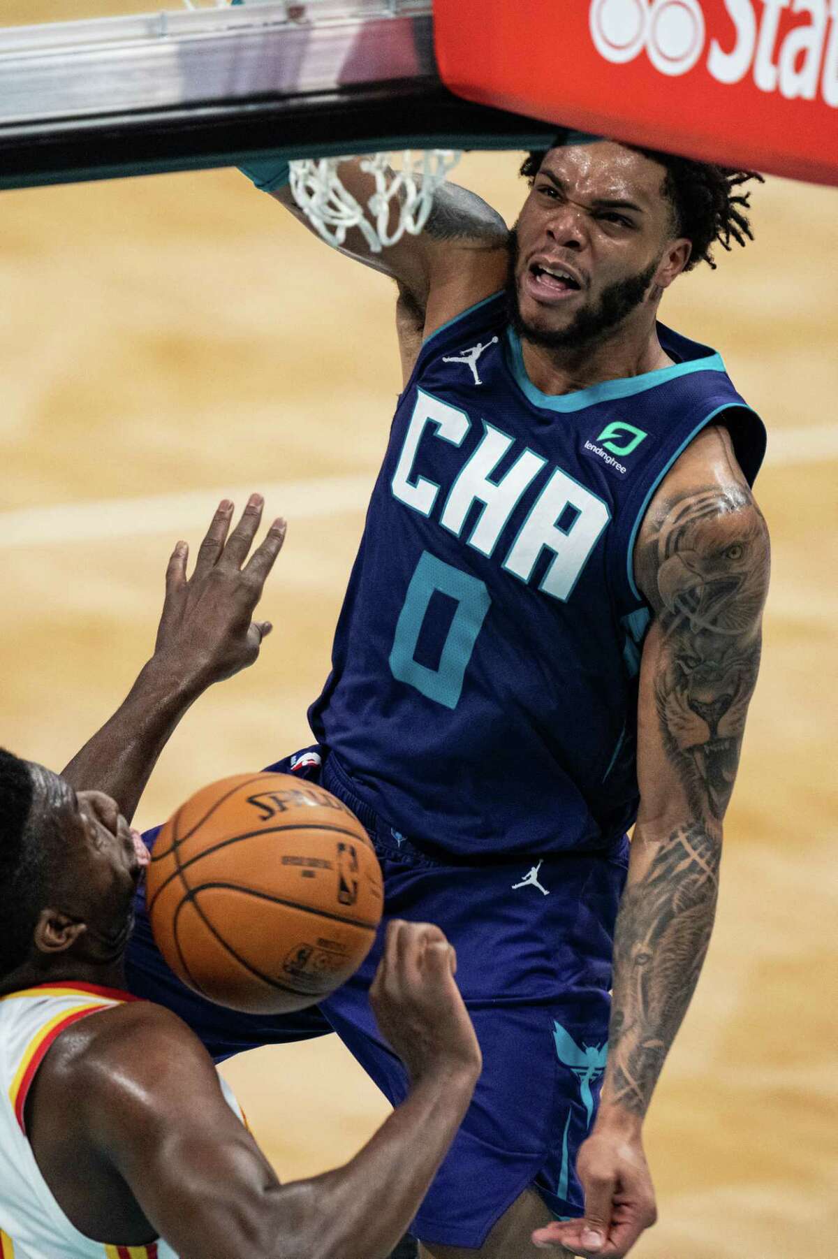 Watch former Rockets center Clint Capela get obliterated by a Miles ...