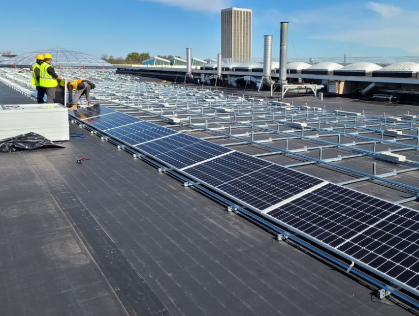 Solar panels are going up atop UAlbany's storied podium buildings