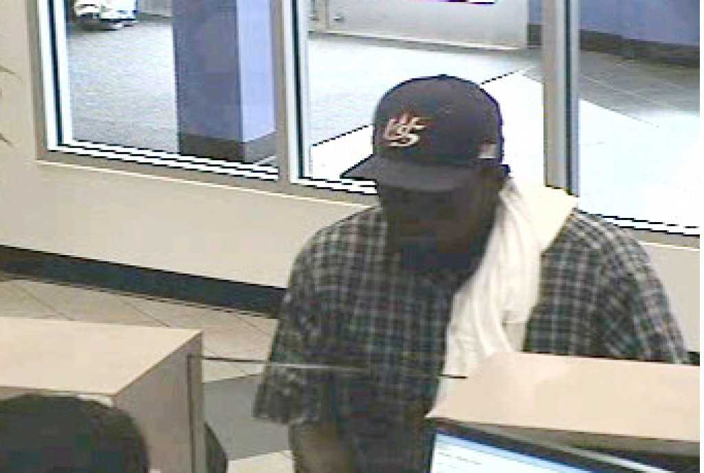 Cops seek bank robber on the run
