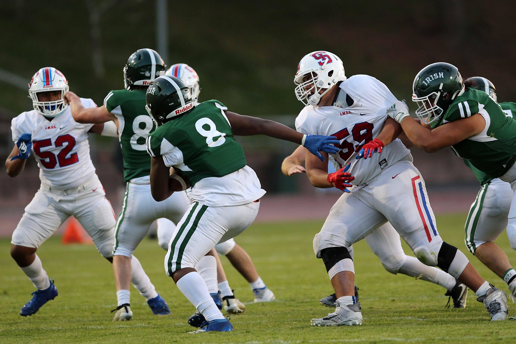 Senior duo hopes for big finish for St. Ignatius football team