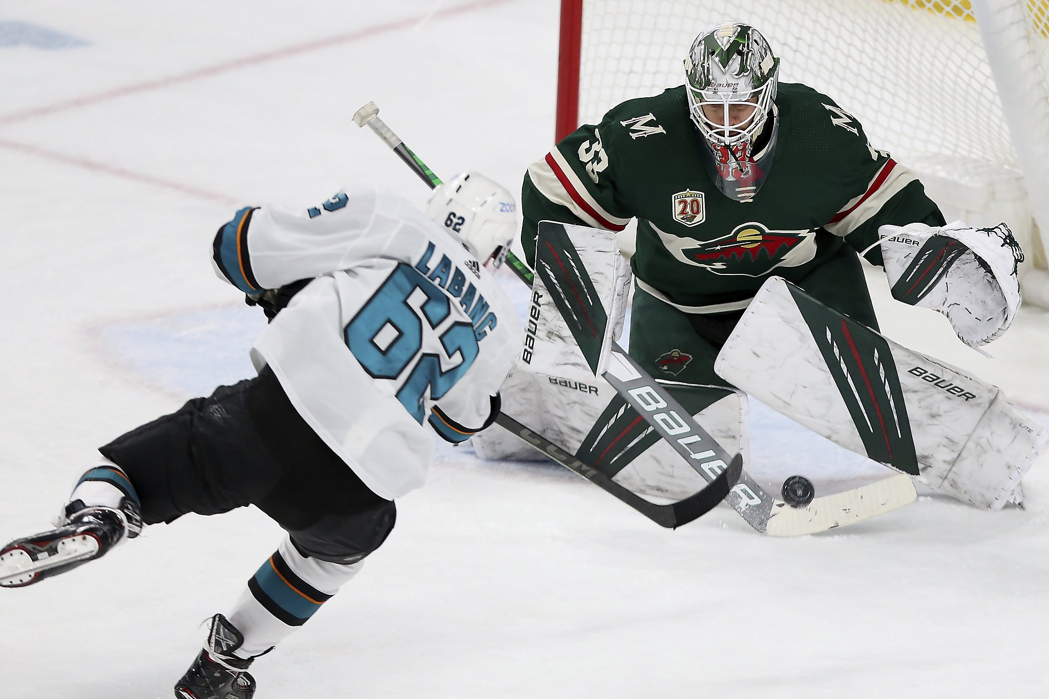 Wild defense firm as Sharks fall 3-2