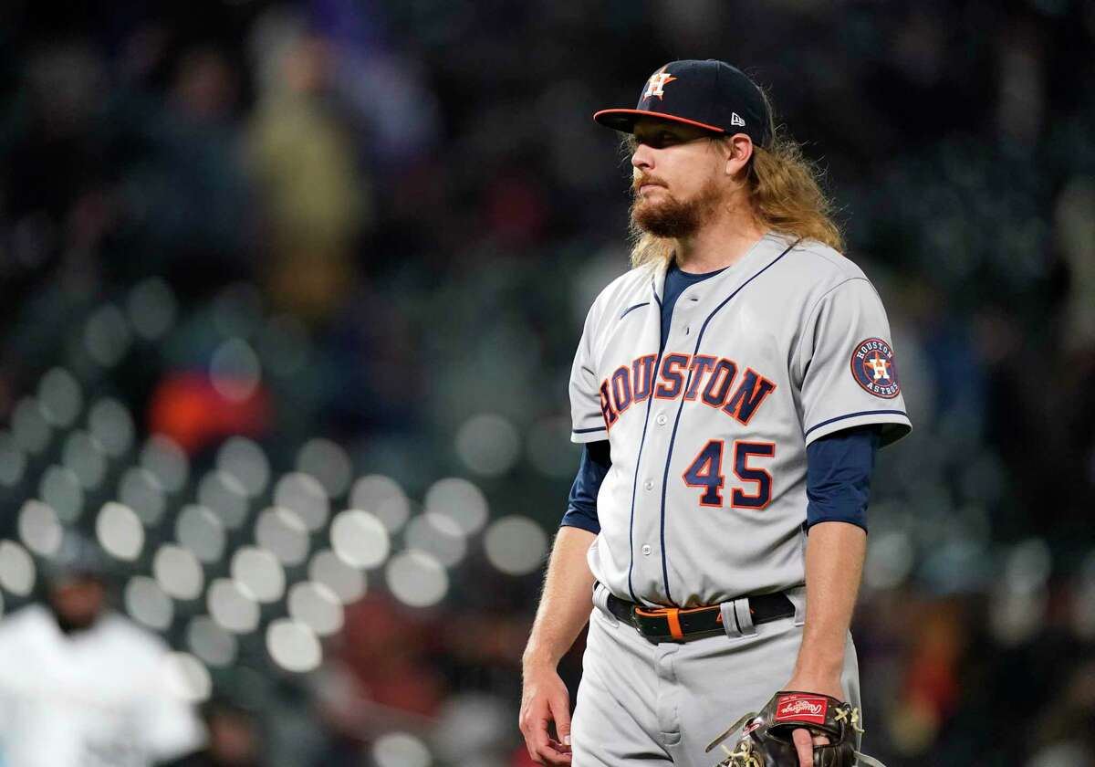 Bats scuffle, bullpen implodes again as Astros fall to Rockies