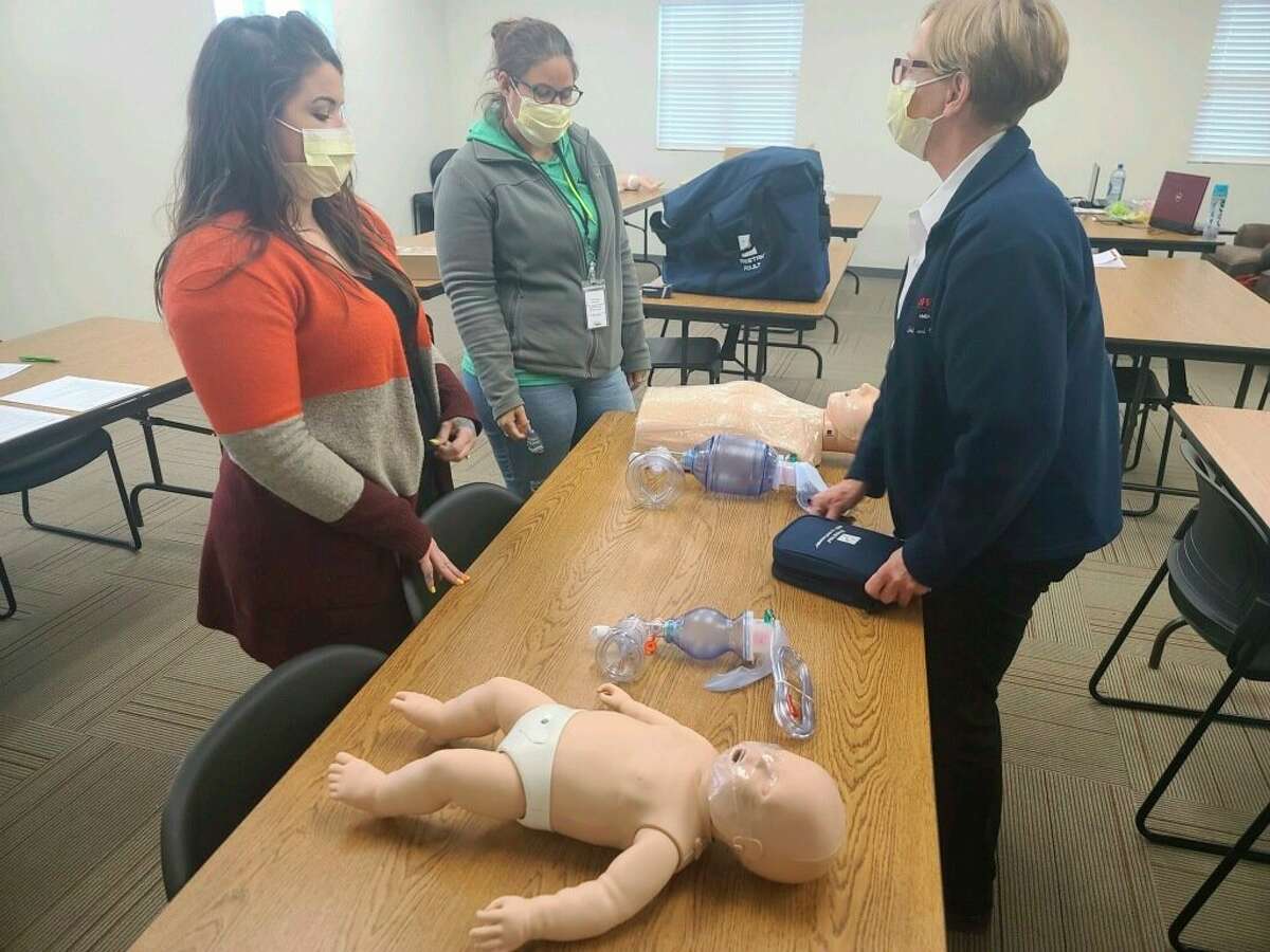 911 dispatch employees participate in training