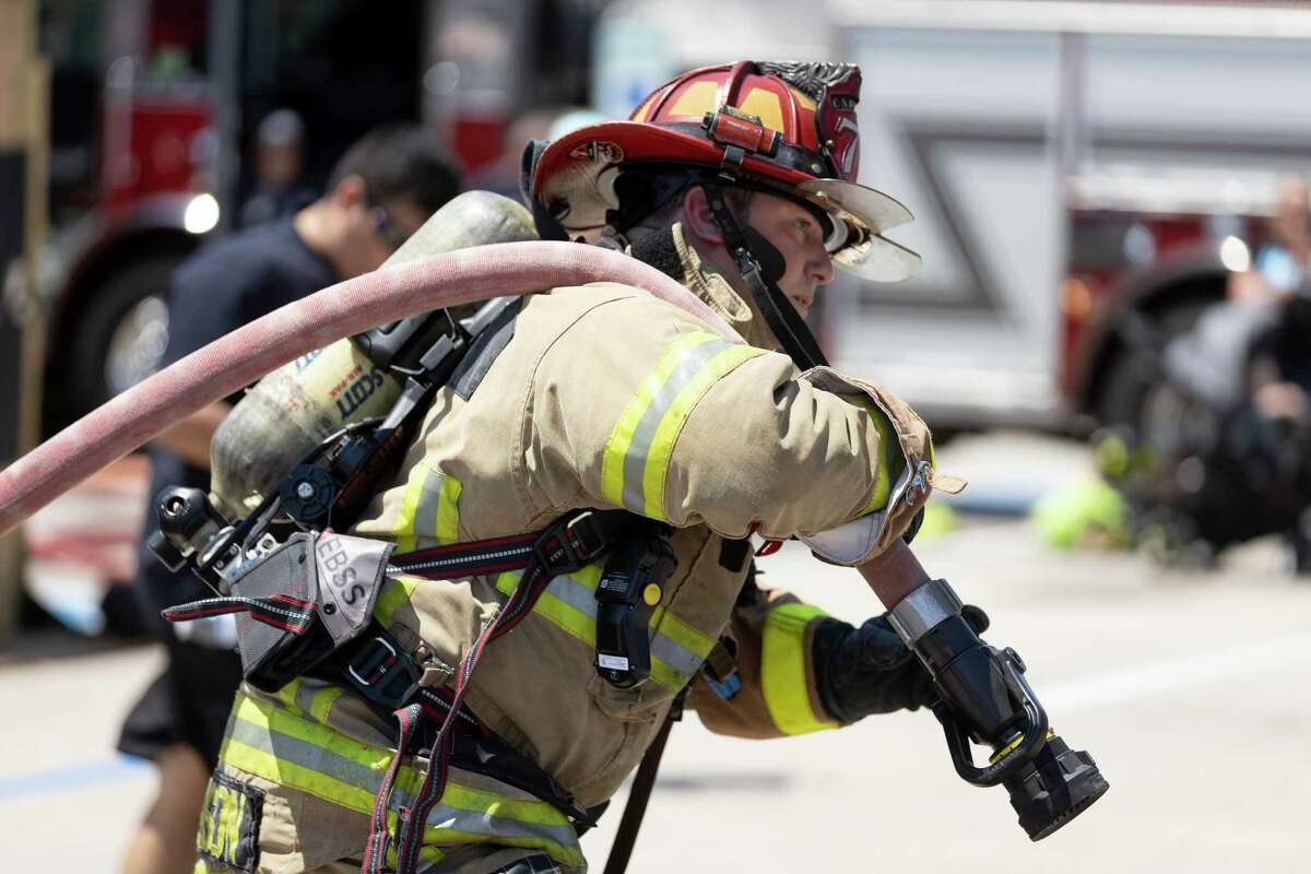 Area fire departments test their skills at North Harris Firefighter ...