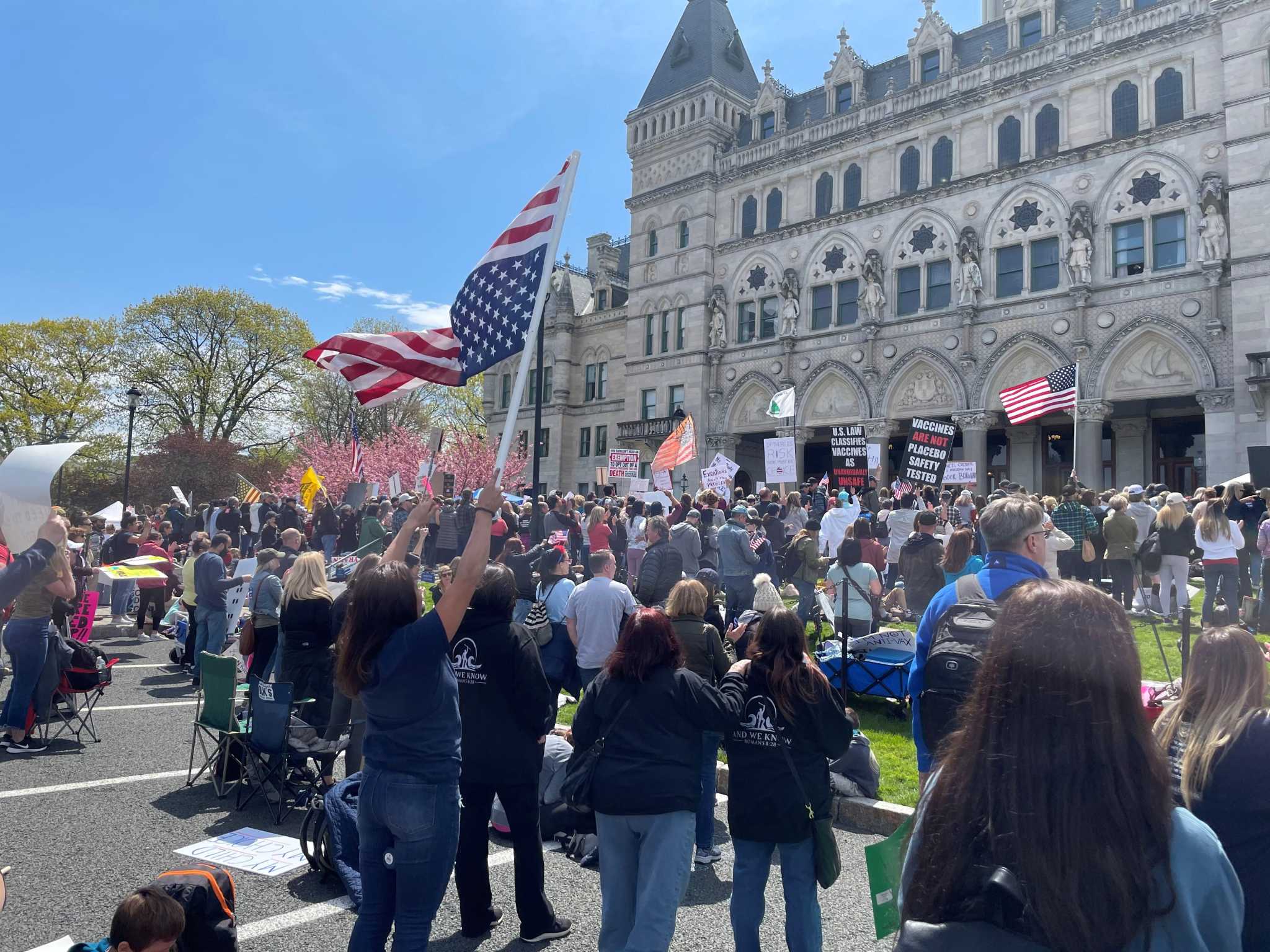 Mandatory vaccine opponents pledge court fight as Lamont signs bill