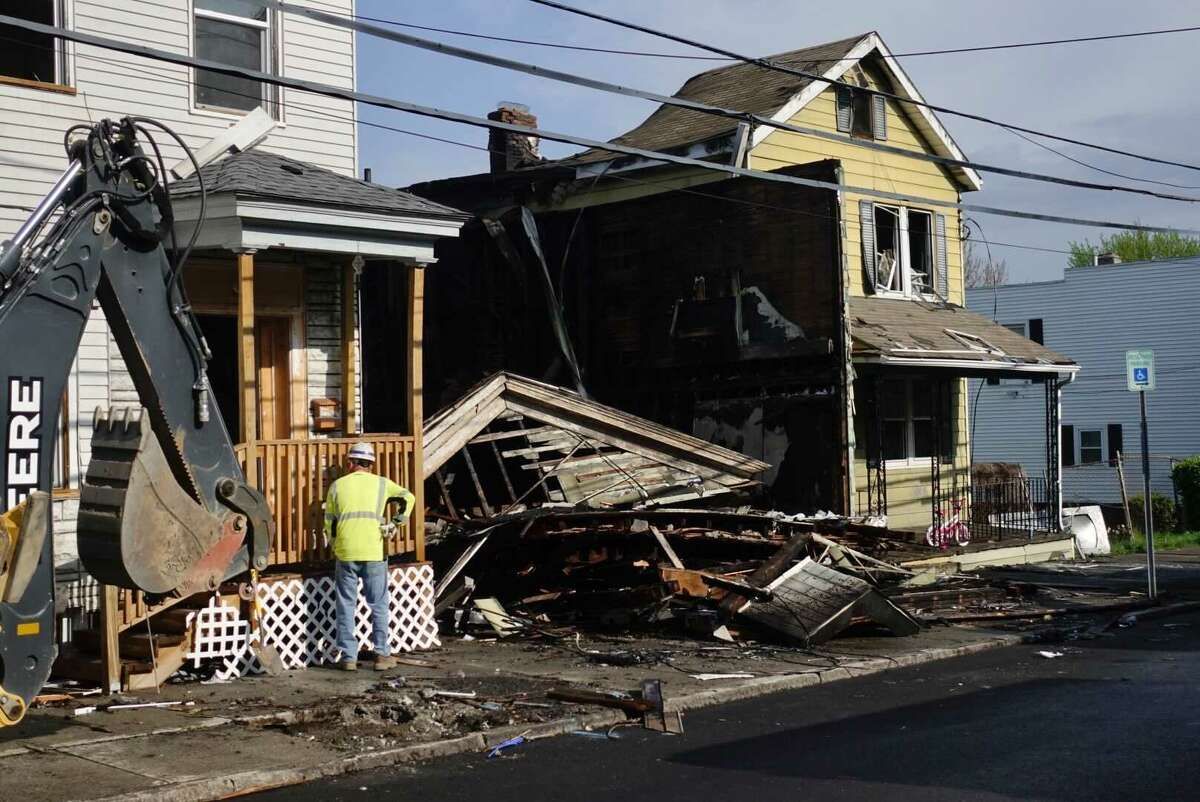Fire guts another row of Troy homes