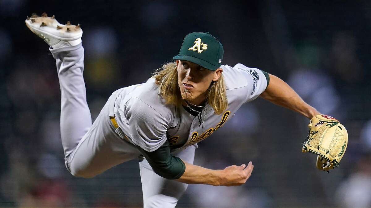 A’s put J.B. Wendelken on IL with strained oblique, recall Jordan Weems