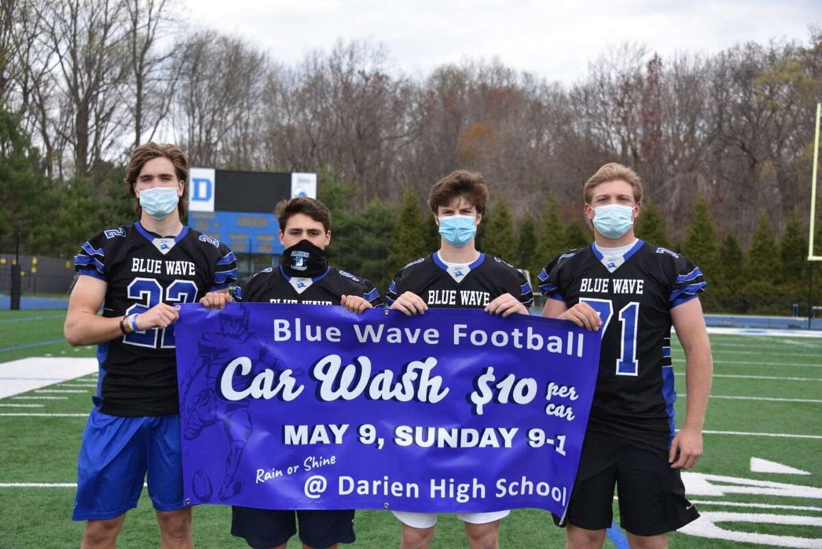Darien High football team holding car wash, food drive Sunday