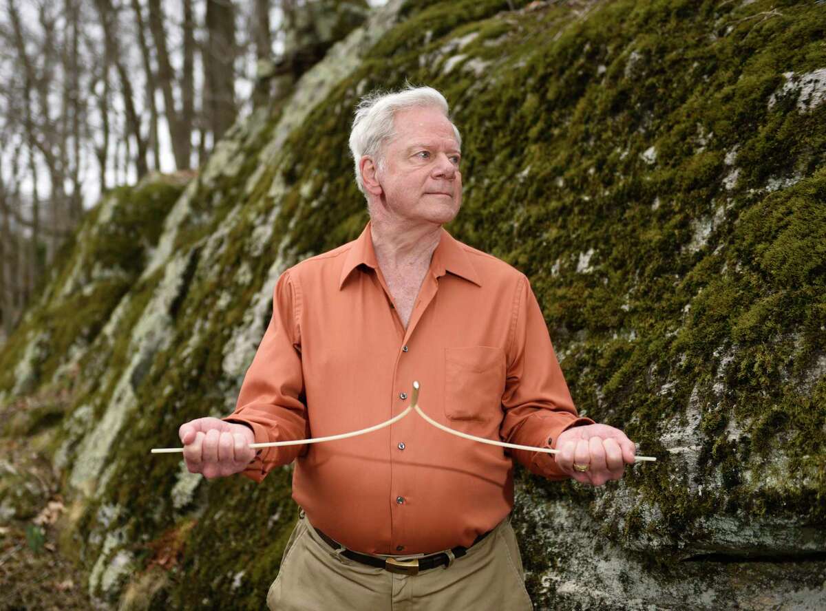 Stamford man tracks down fossils, time capsules and more through dowsing