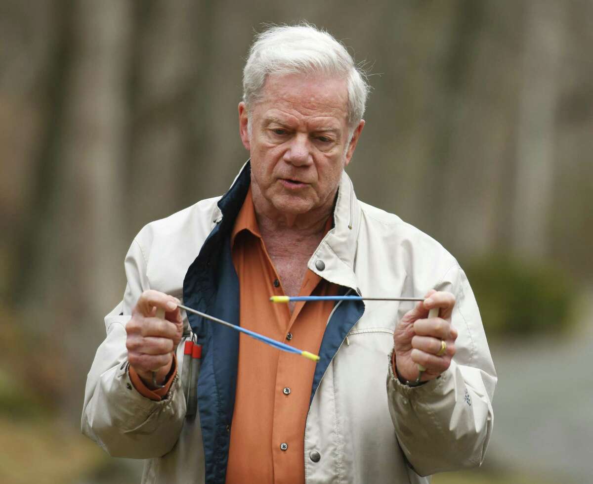 Stamford man tracks down fossils, time capsules and more through dowsing