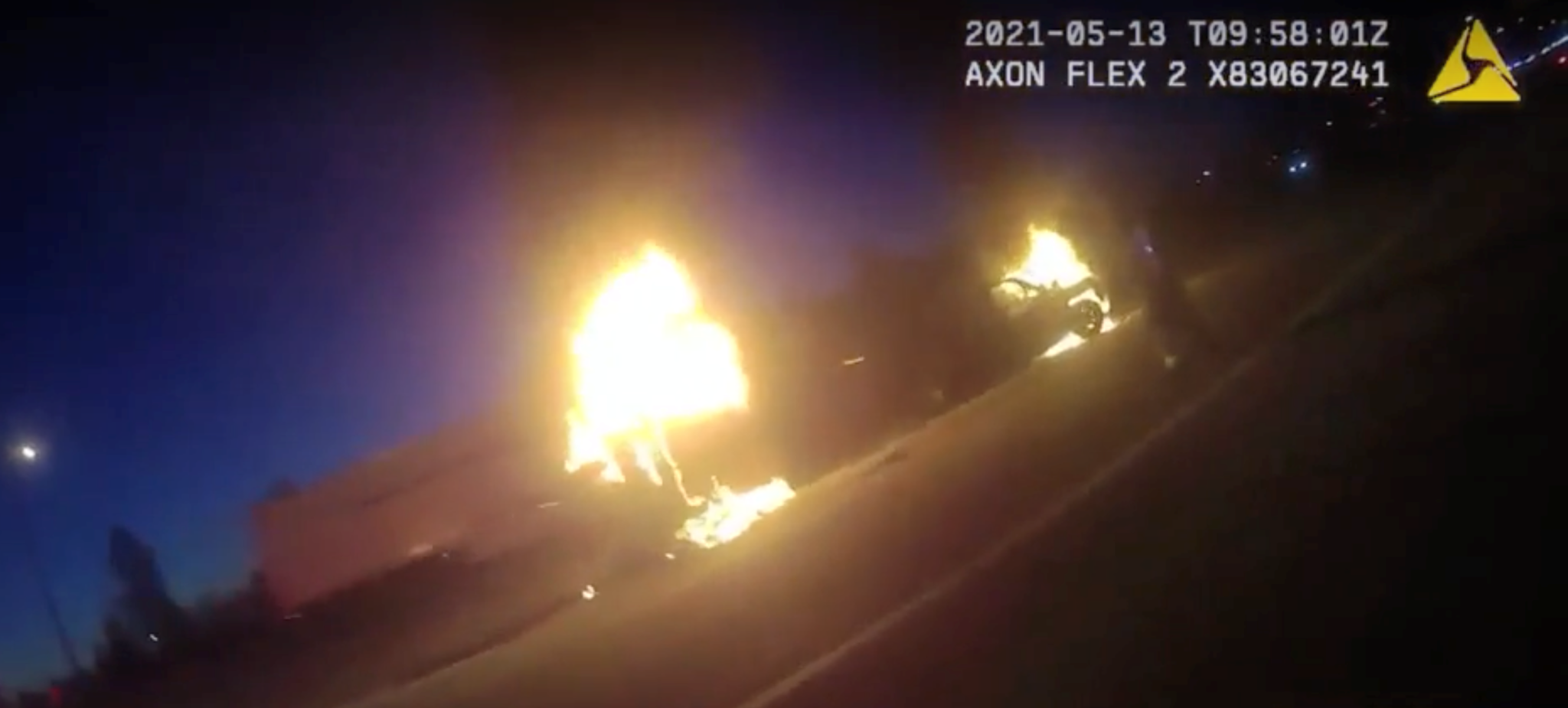 WATCH: Two people rescued from burning cars just minutes before explosion