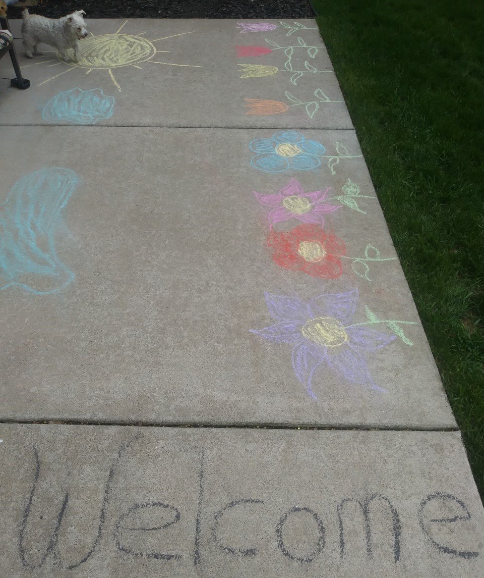 Manistee Place residents brighten community with chalk art