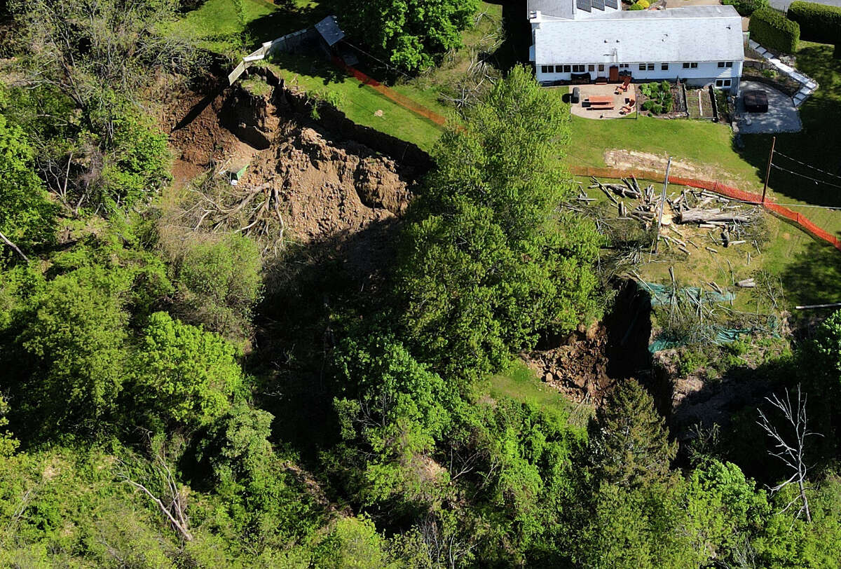 Photos: Delmar landslide makes parts of two backyards vanish