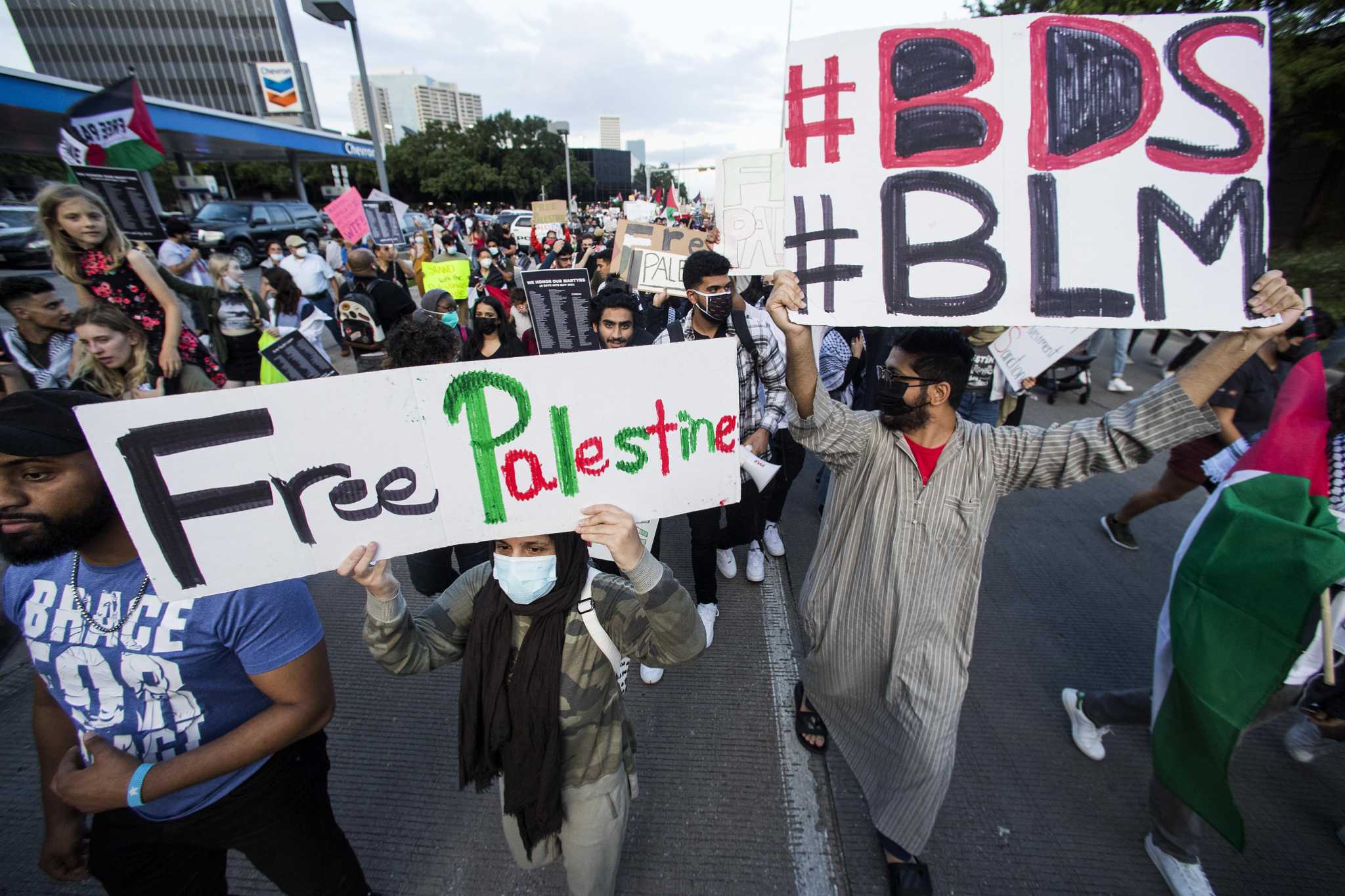 'A wake-up call for all humanity': Hundreds march to support ...