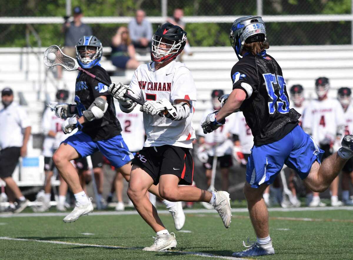 No. 1 Darien boys lacrosse survives No. 2 New Canaan on Pokorny’s late goal