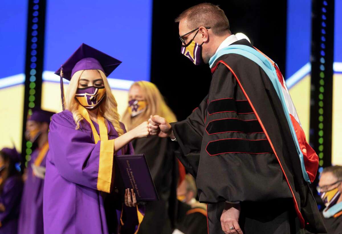 First class: Booker T. Washington High School graduates inaugural seniors