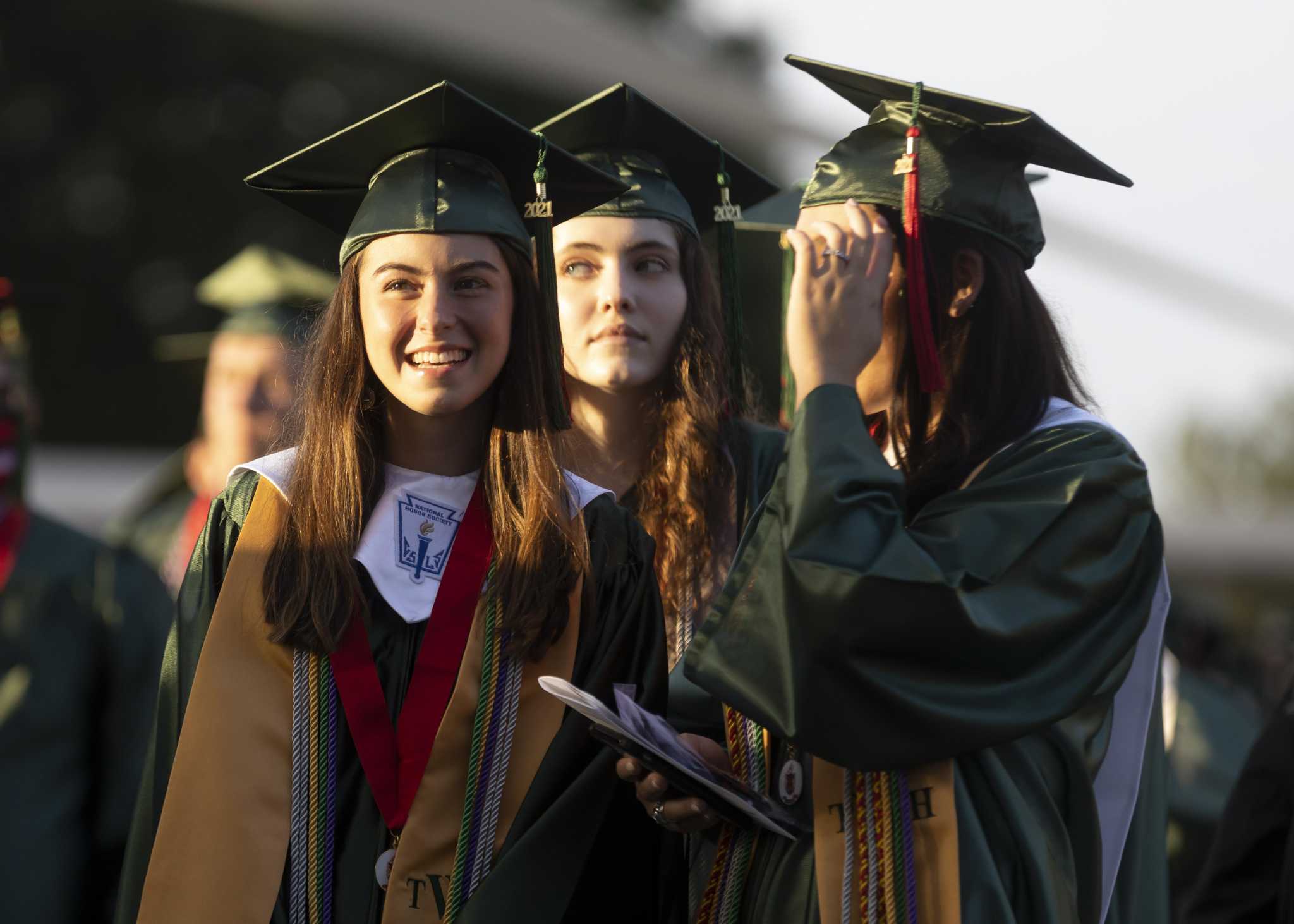 ‘A new beginning’: 1K Highlanders walk stage at Woodlands High graduation