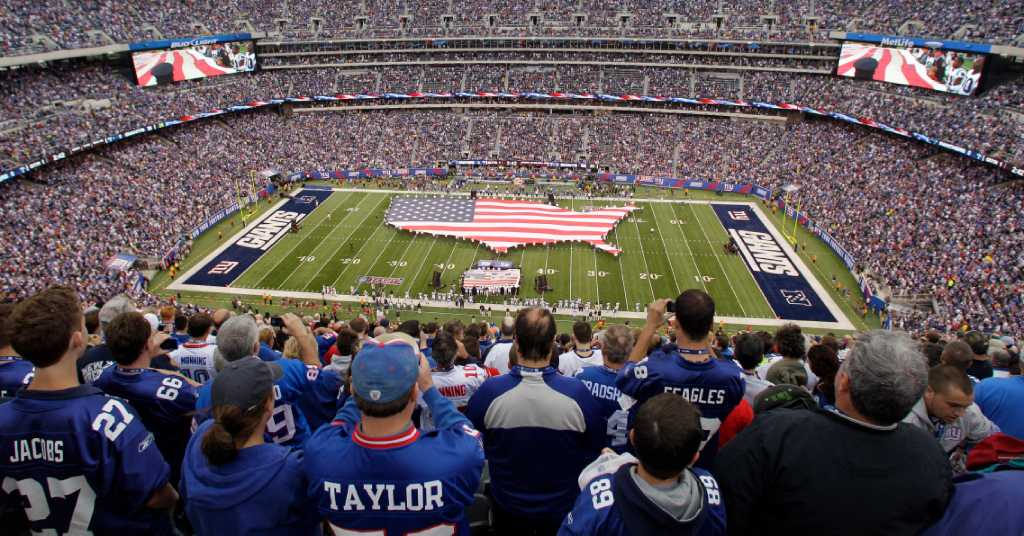 Giants play first regular season game in new home