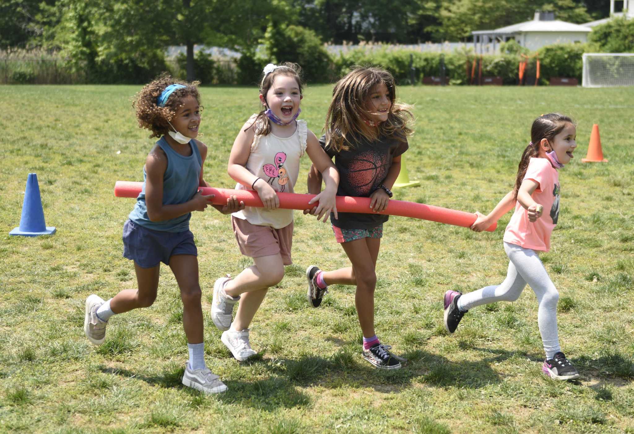 In photos: Old Greenwich School students race outside for the day
