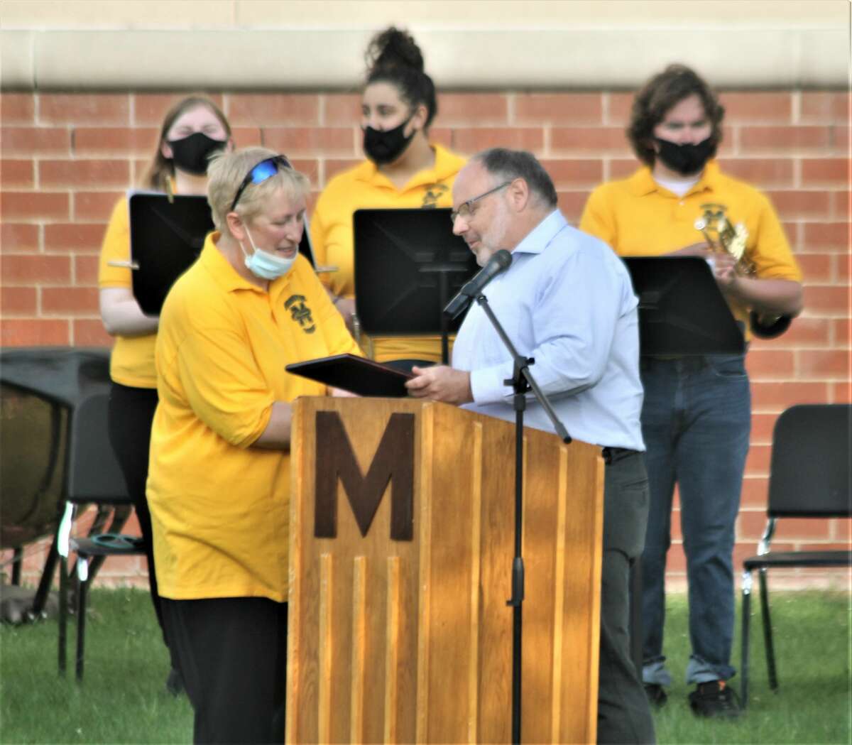 Manistee director of bands presented Teacher of the Year award at ...