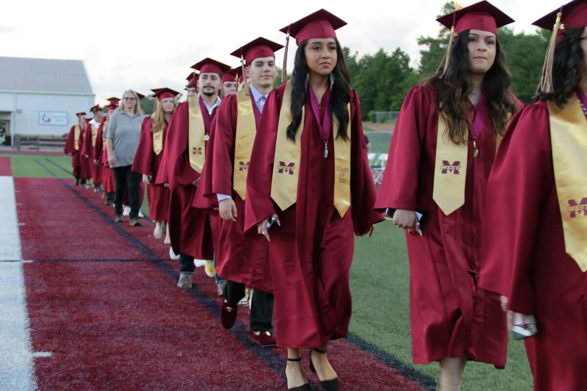 After weather postpones ceremony, resilient grads walk the stage at ...