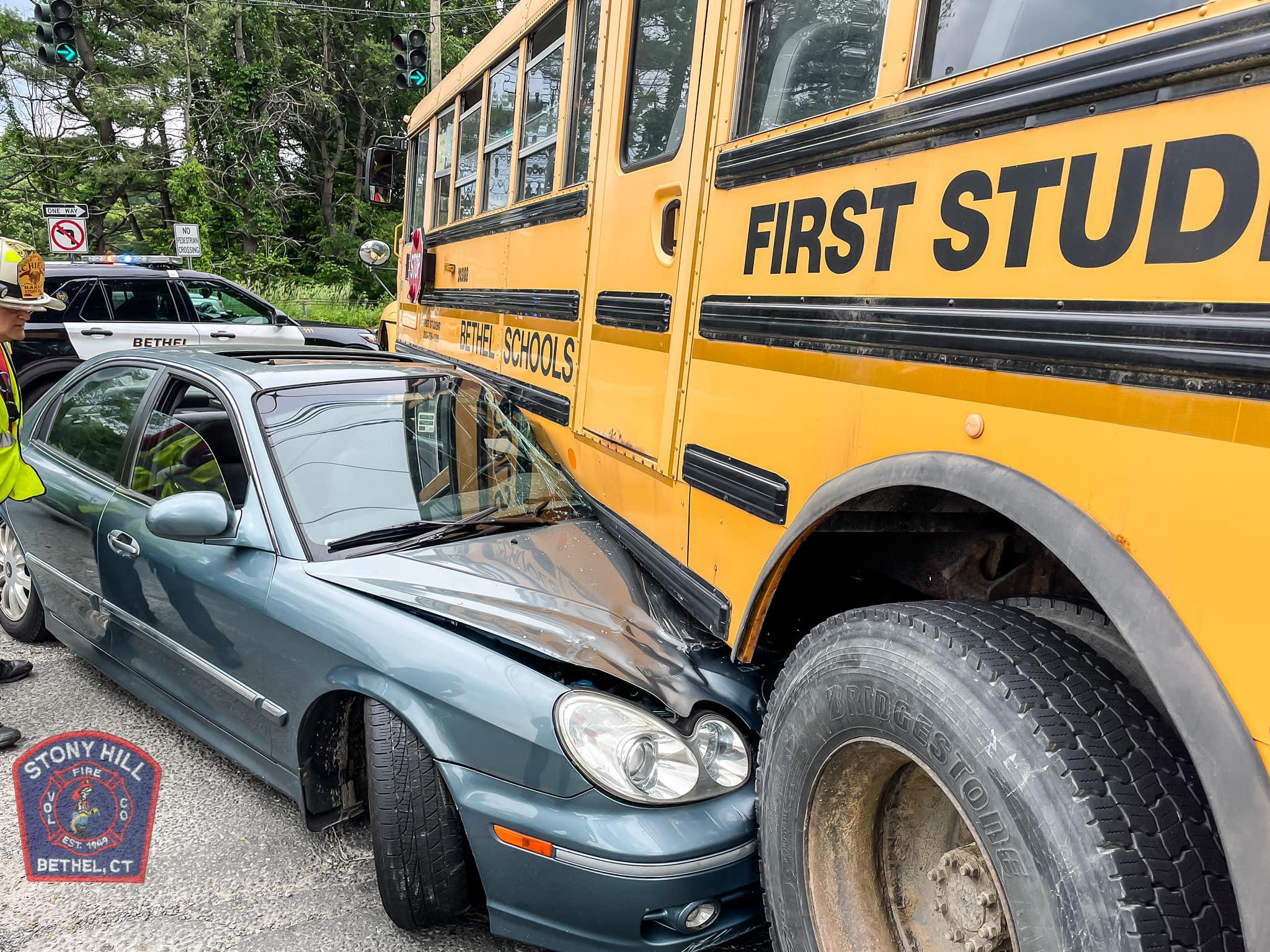 Students, drivers uninjured in Bethel car vs. school bus crash