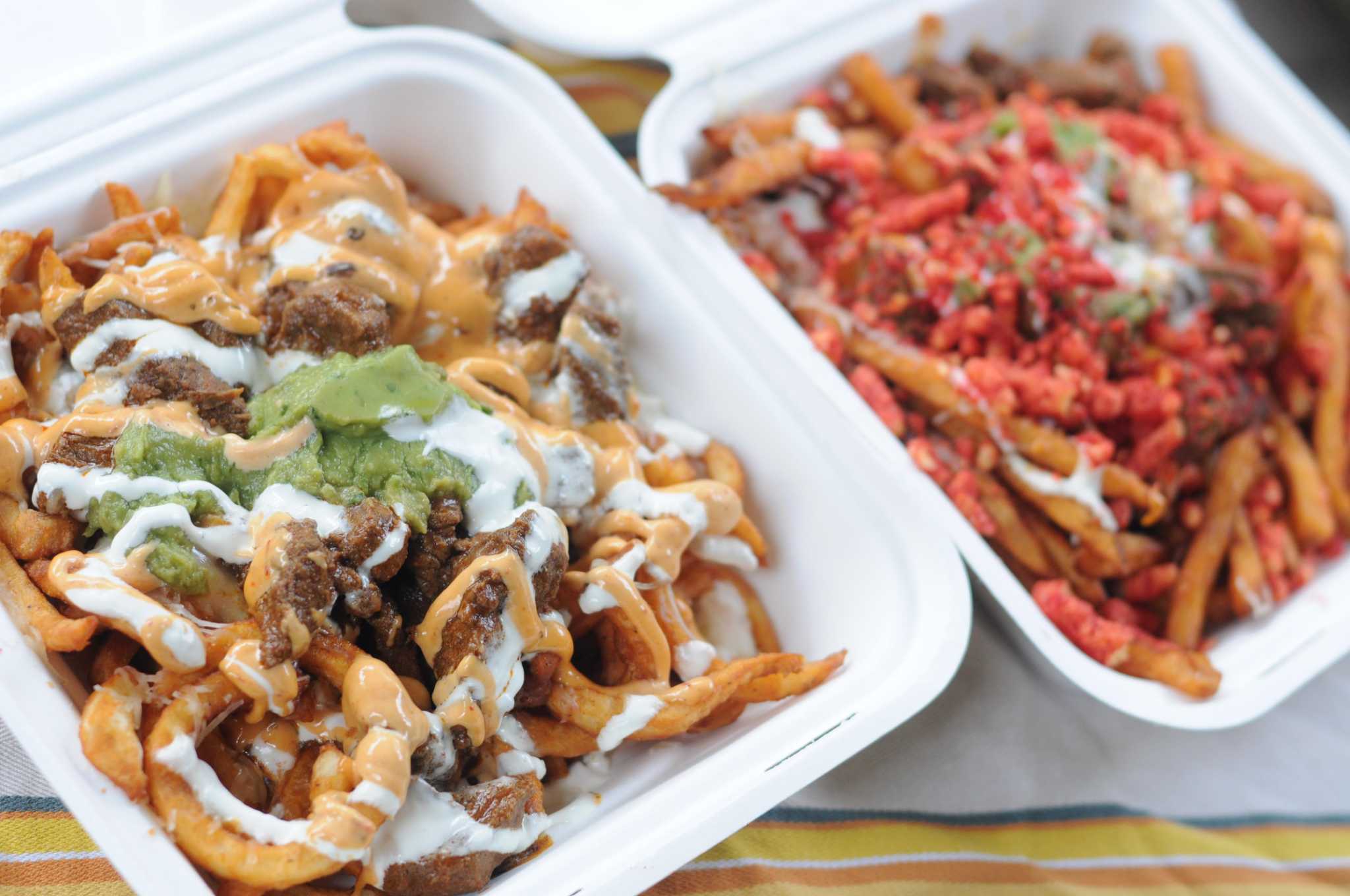 Curly or straight, loaded or wrapped, Man vs Fries has the craveable ...