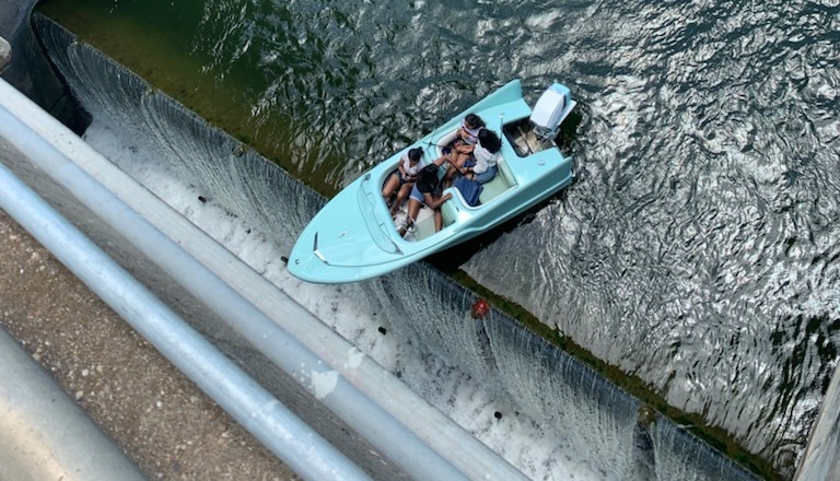 Boaters survive nearly tipping over a Texas dam