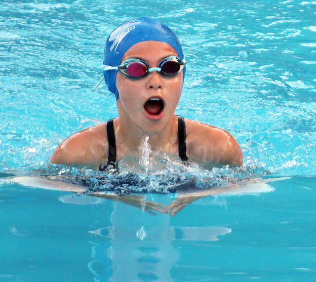 Marlins swim past Summers Port in opener