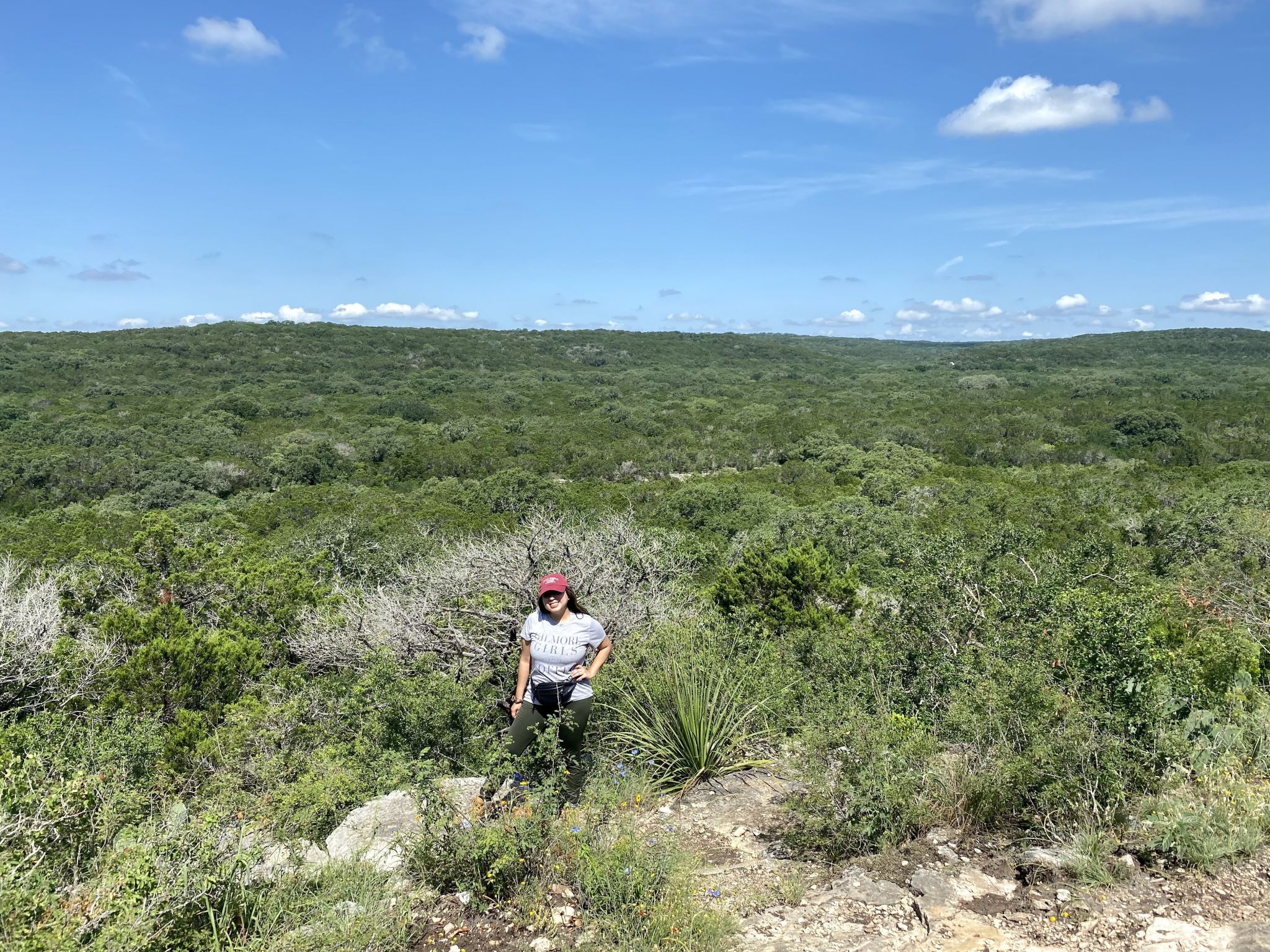 Hiking a trail with stunning views at Government Canyon State Natural Area