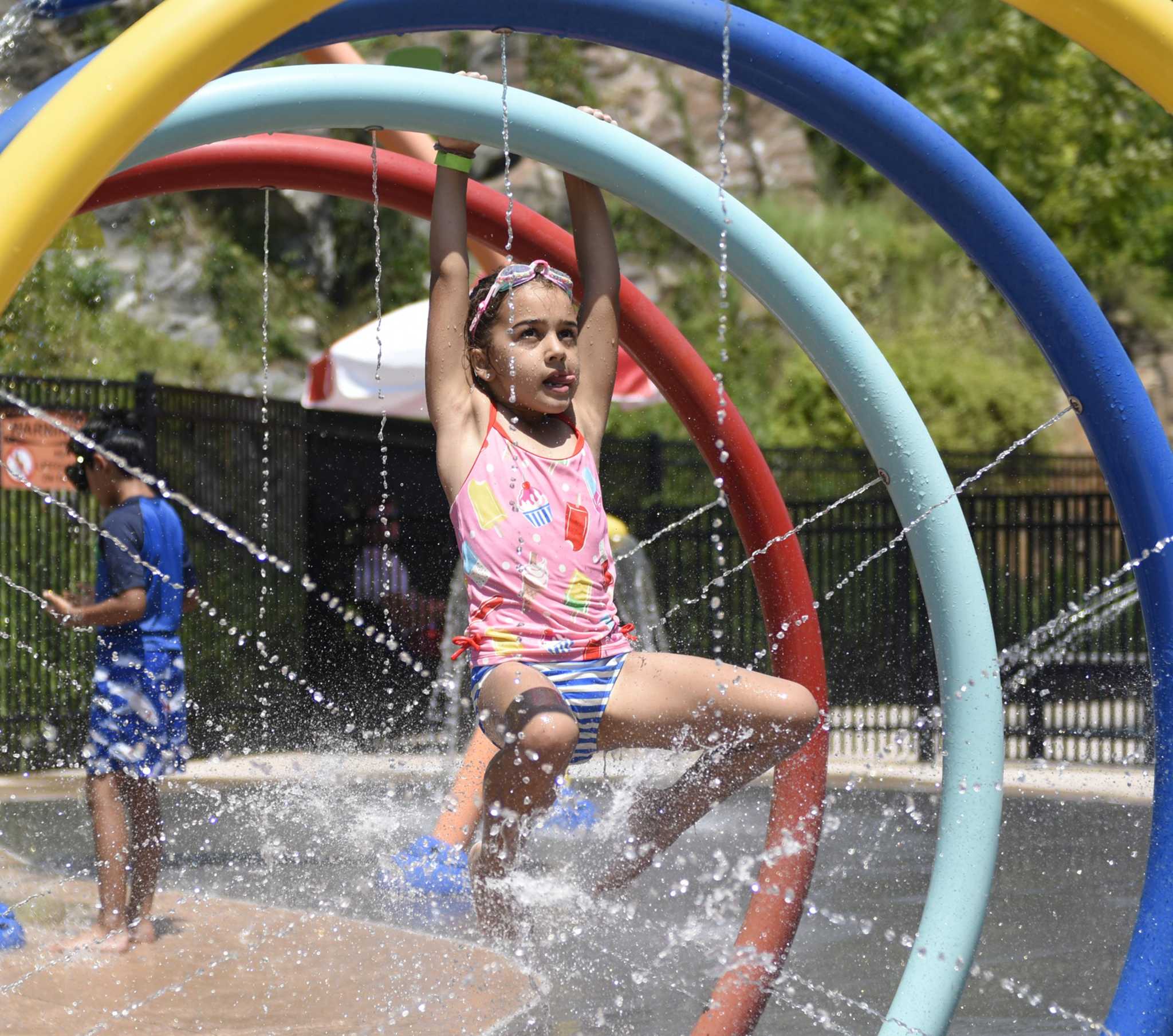 In photos: Greenwich beats the heat at pool, splash pad at Byram Park
