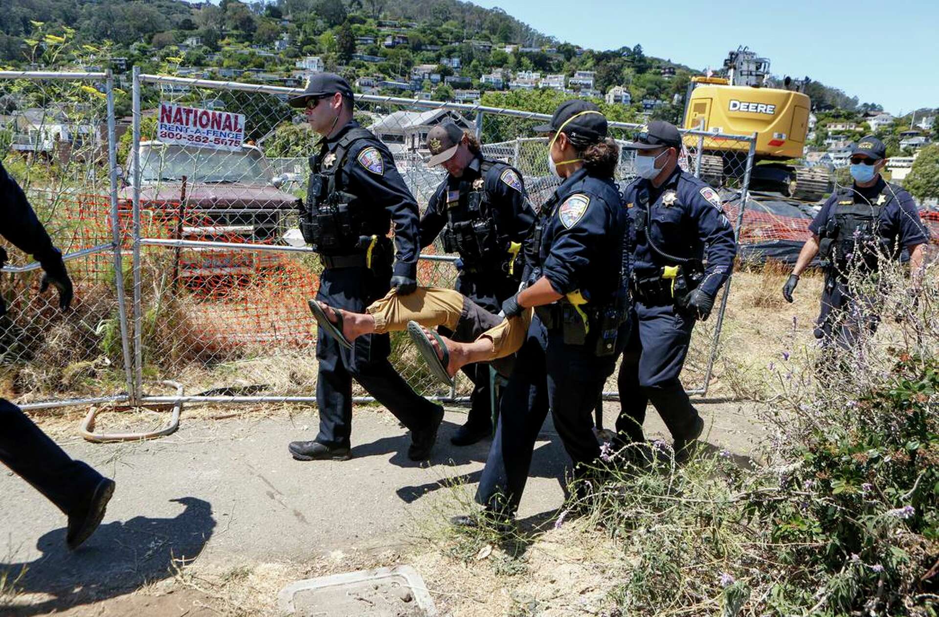 Police, equipped with a bulldozer, dismantle Sausalito tent encampment