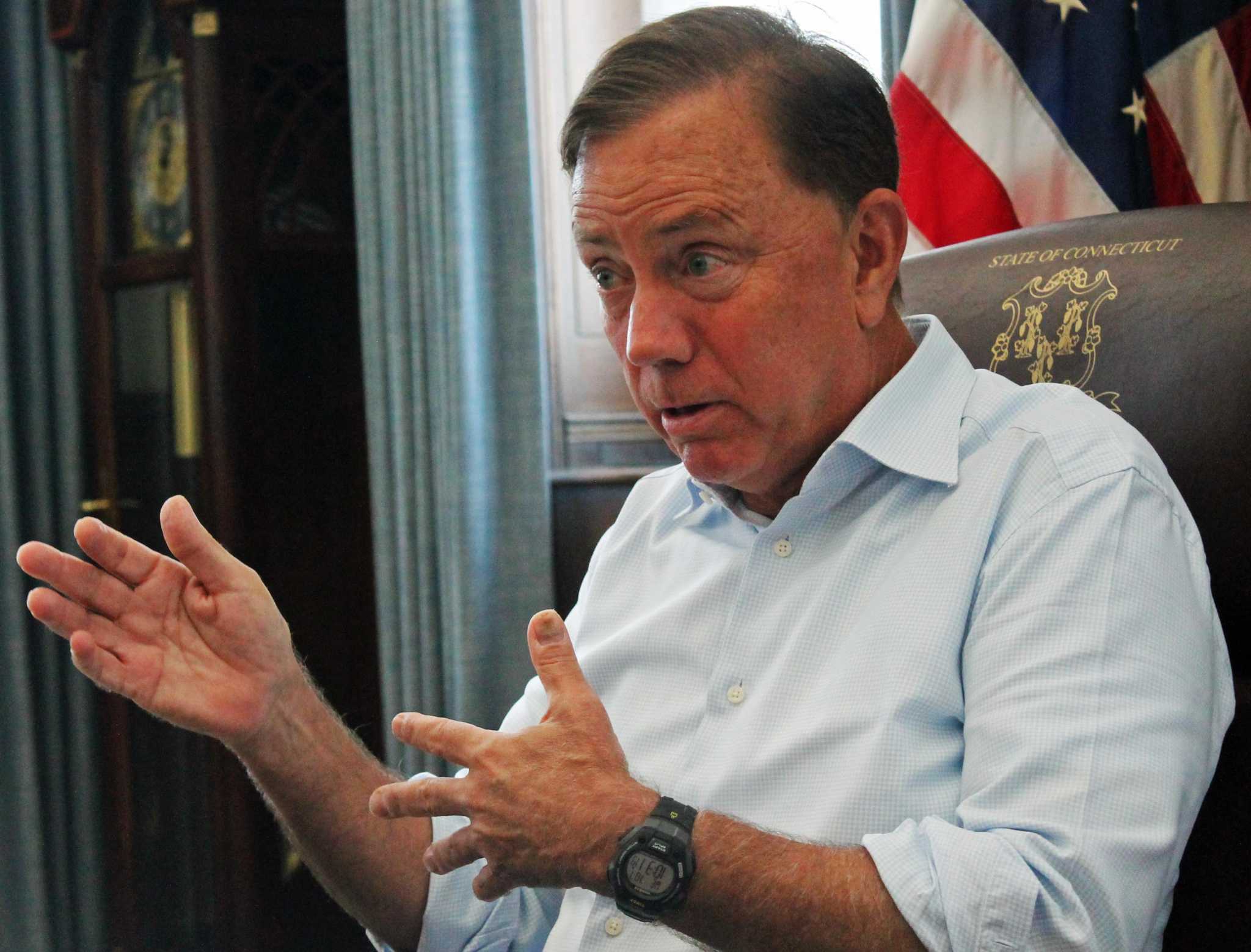 Lamont signs police reform bill; hard work remains