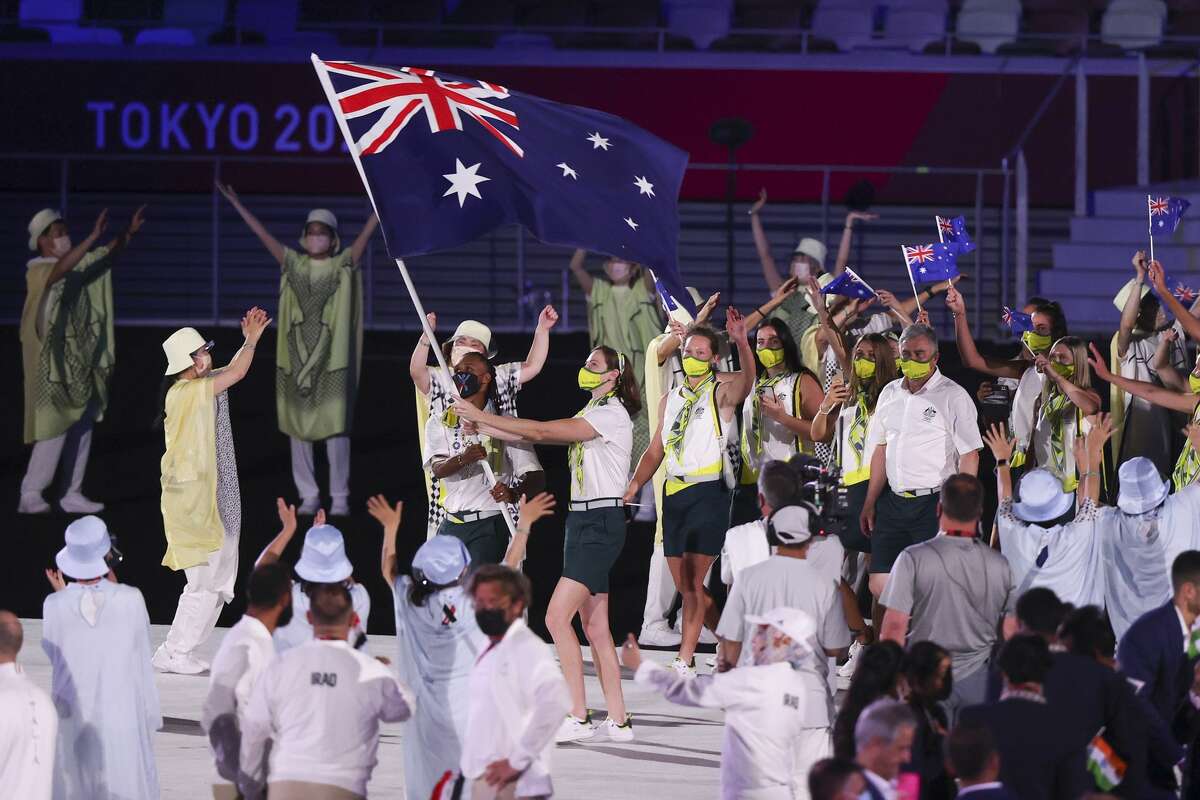 Patty Mills makes Olympics history as Australia's flag bearer
