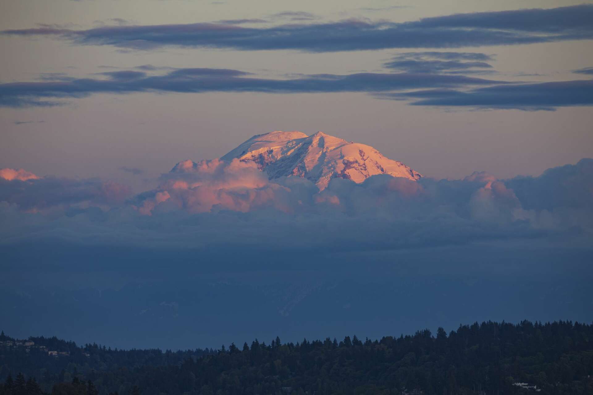 The mountain is out: Mount Rainier shows rocky face after record ...