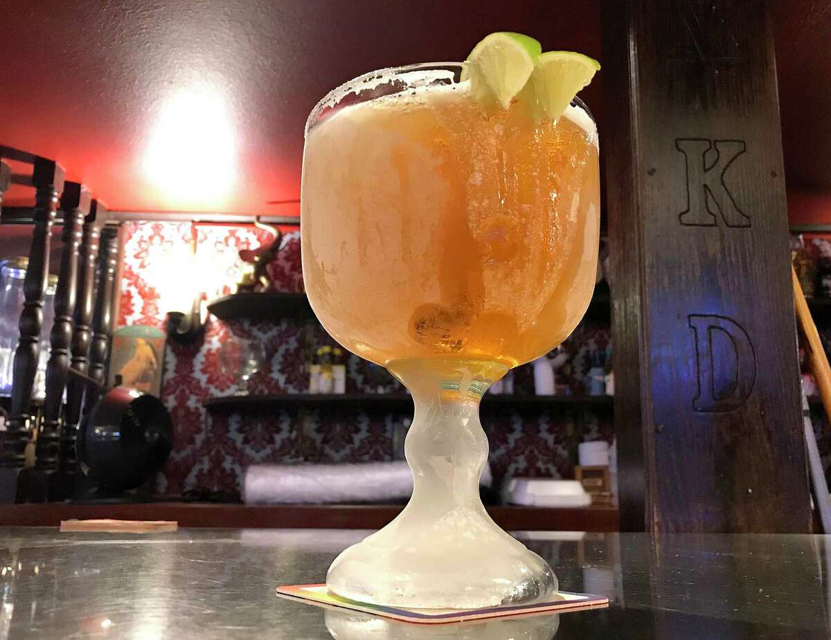 The best deal on an ice-cold schooner of beer is at the puro San ...