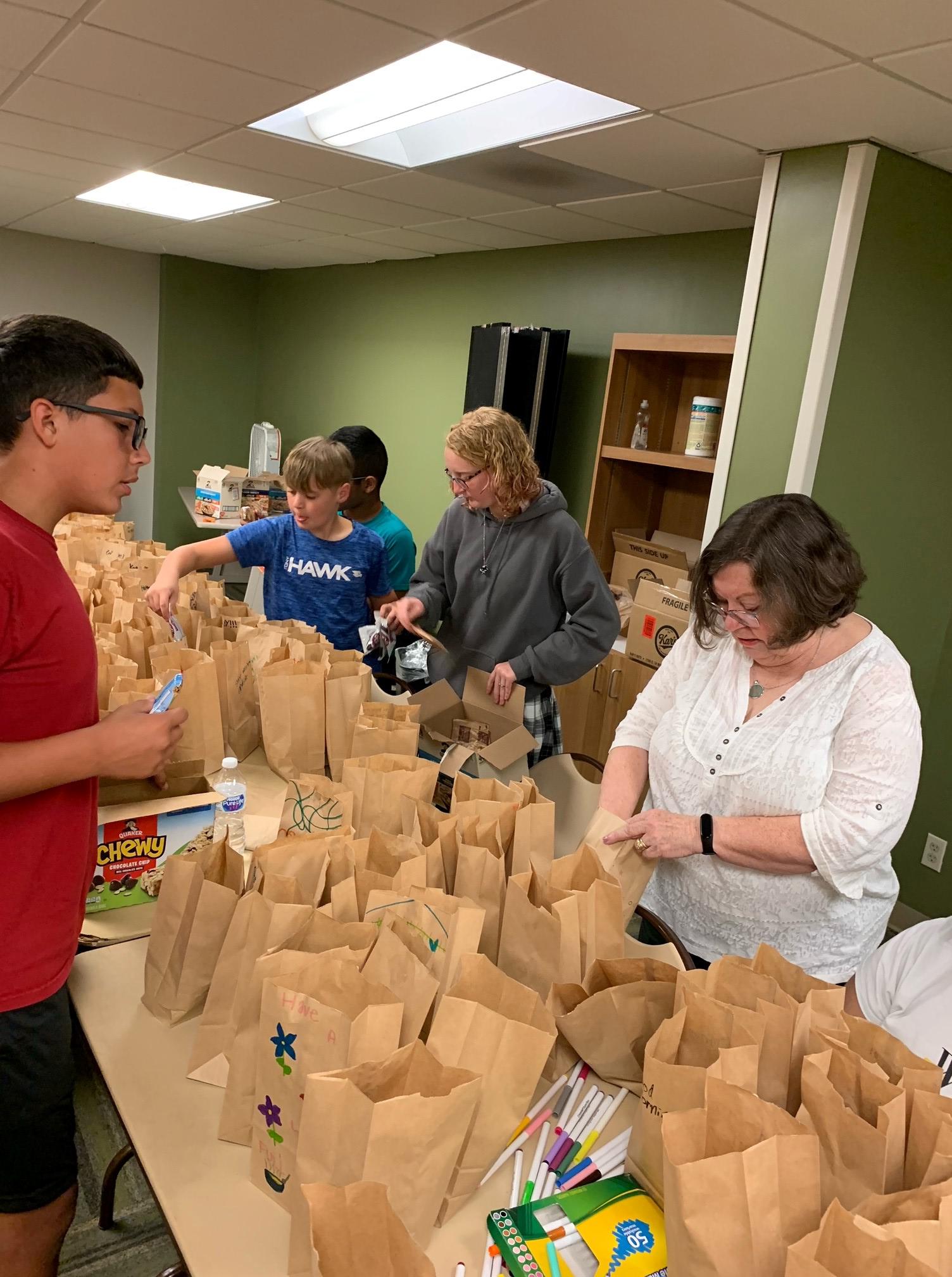 Teens in Conroe rec program decorate, fill bags for Meals on Wheels