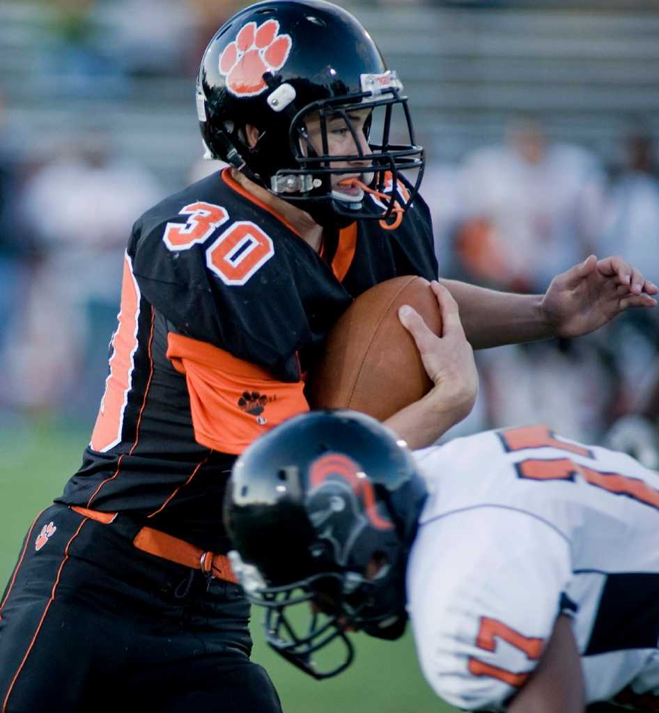 Ridgefield football opens season with lopsided win